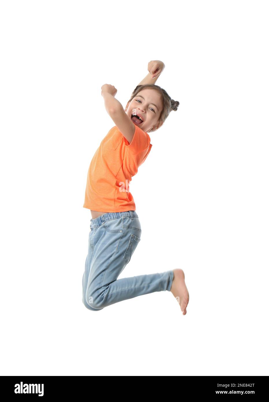 Cute little girl jumping on white background Stock Photo - Alamy