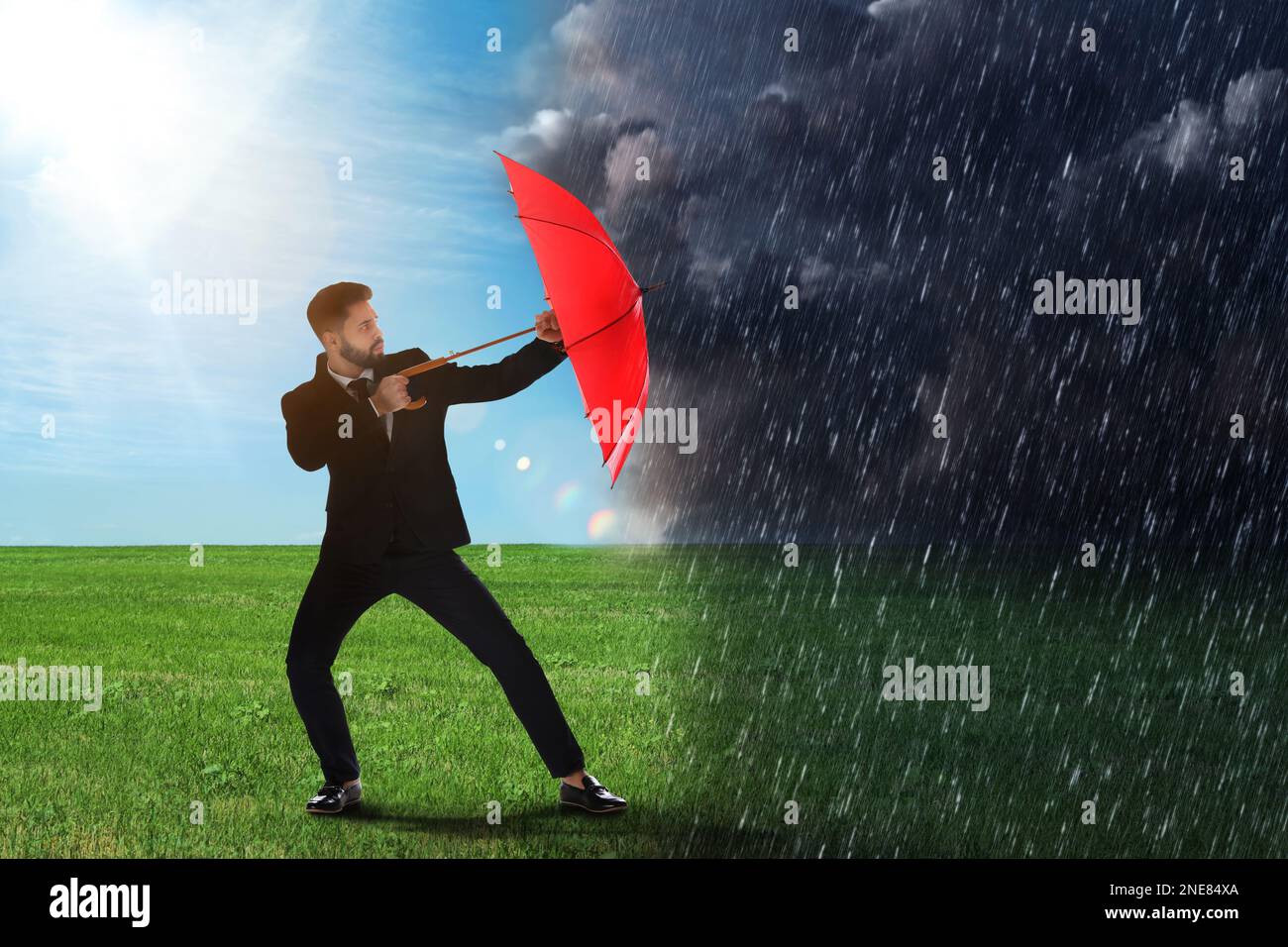 Man heavy rain hiding hi-res stock photography and images - Alamy