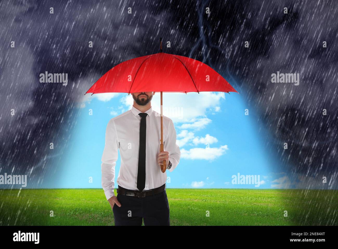 Man heavy rain hiding hi-res stock photography and images - Alamy