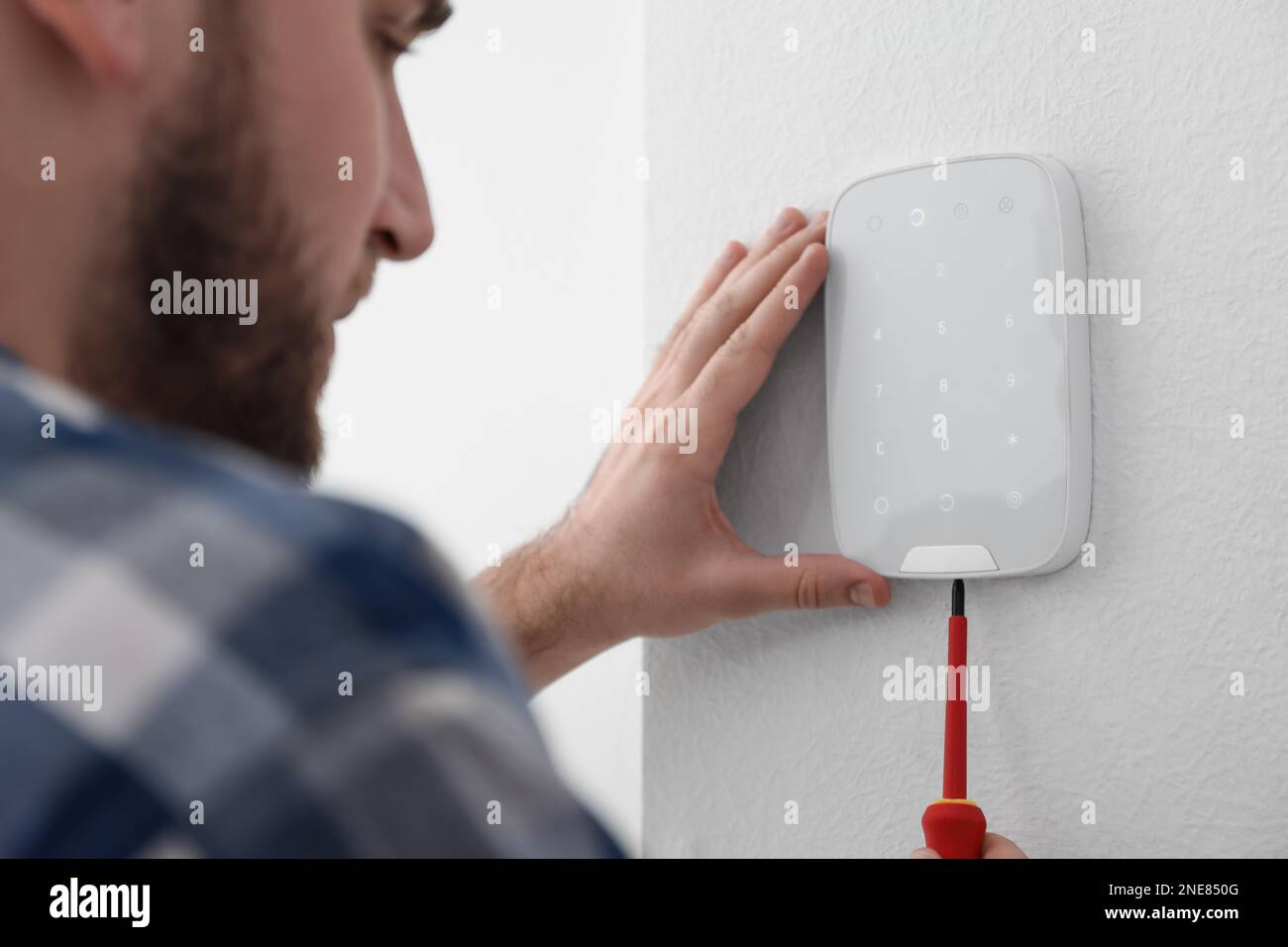Man installing device home hi-res stock photography and images - Alamy