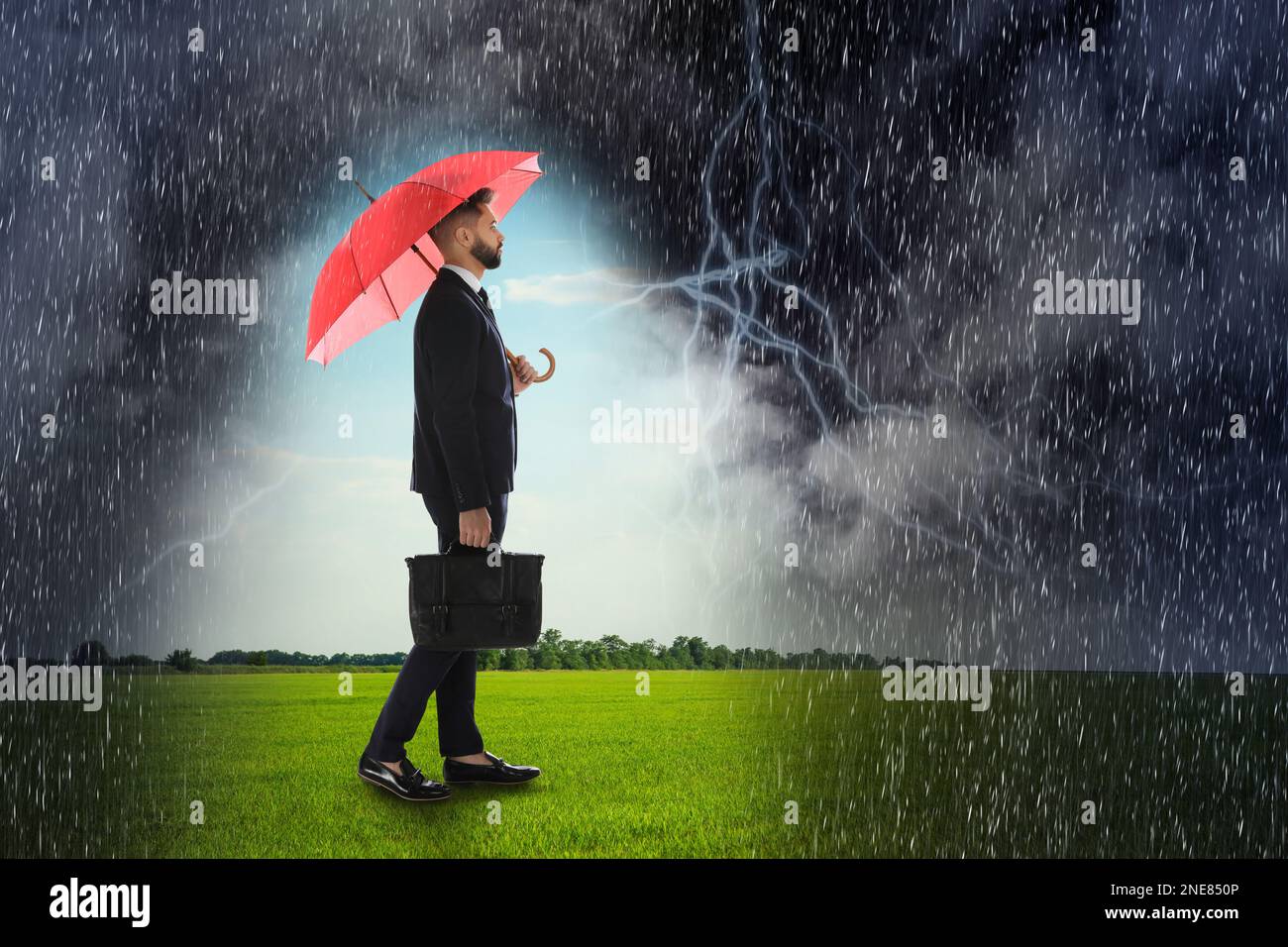 Man heavy rain hiding hi-res stock photography and images - Alamy