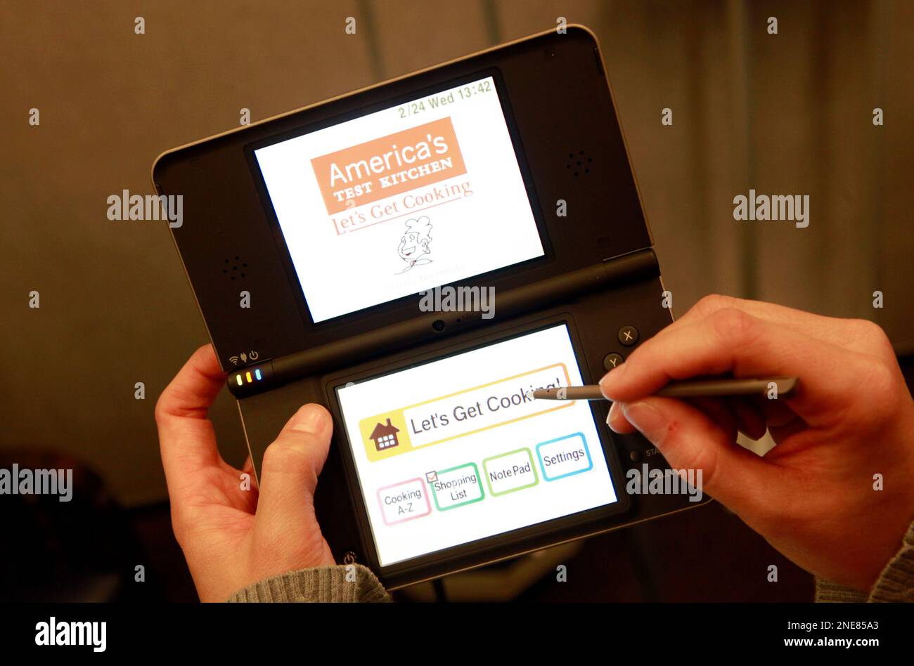 The Nintendo DSi XL hand held system is shown at Nintendo's Q1 Media ...