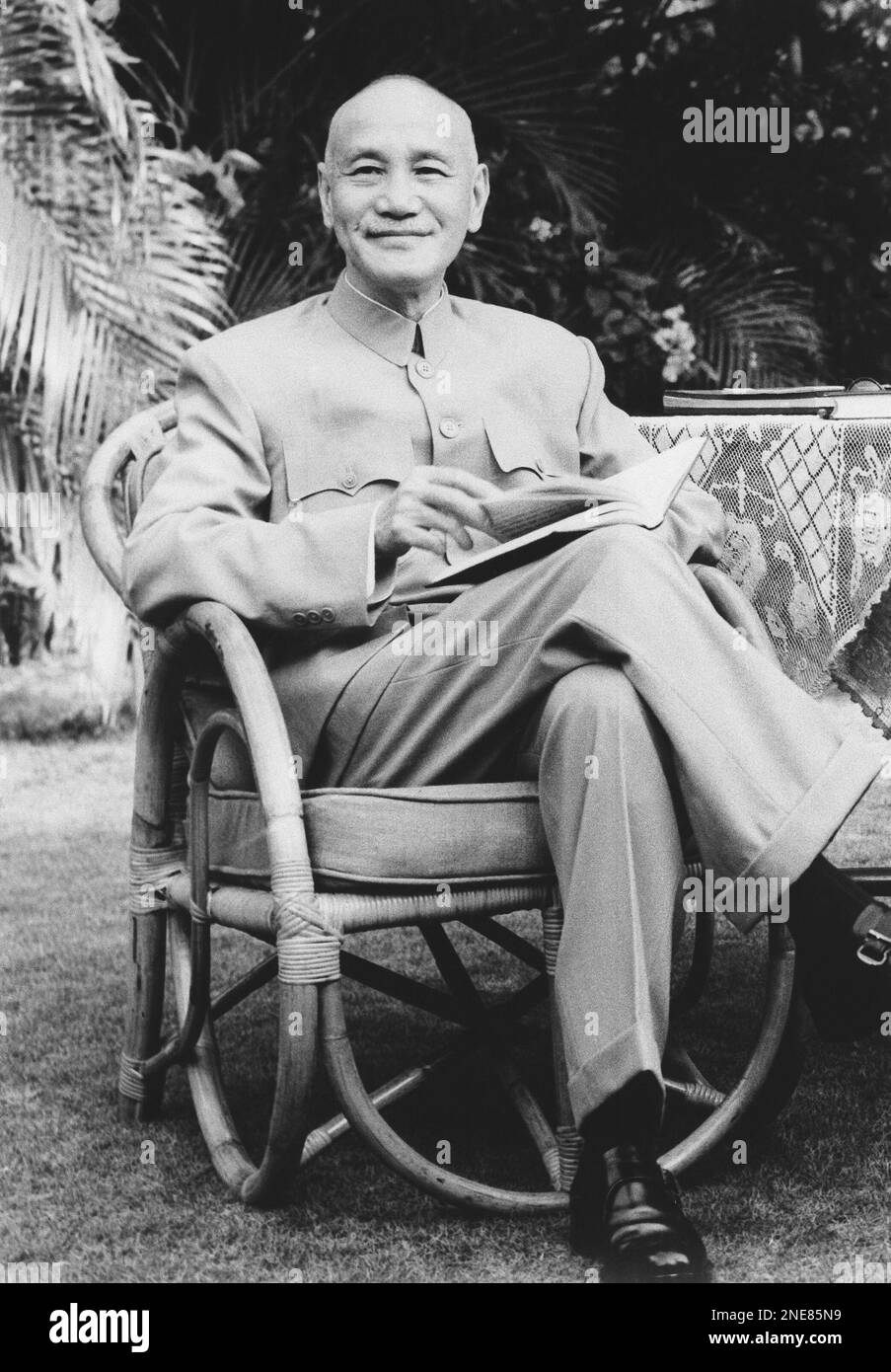 President Chiang Kai-shek is seated in the garden of their Shihlin ...
