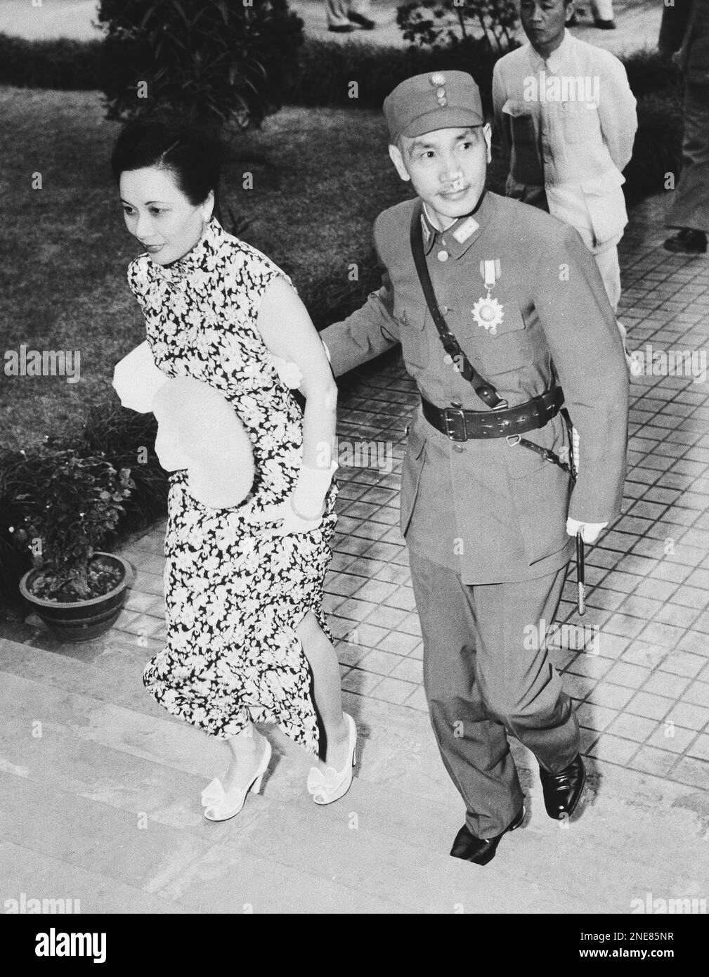 Generalissimo and his wife Soong May Ling, arrive at ceremonies in ...
