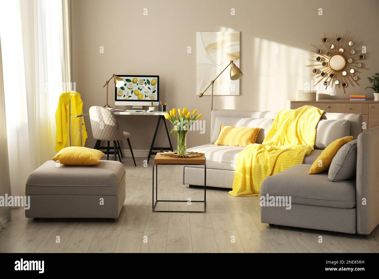 Stylish living room with sofa. Interior design in grey and yellow ...