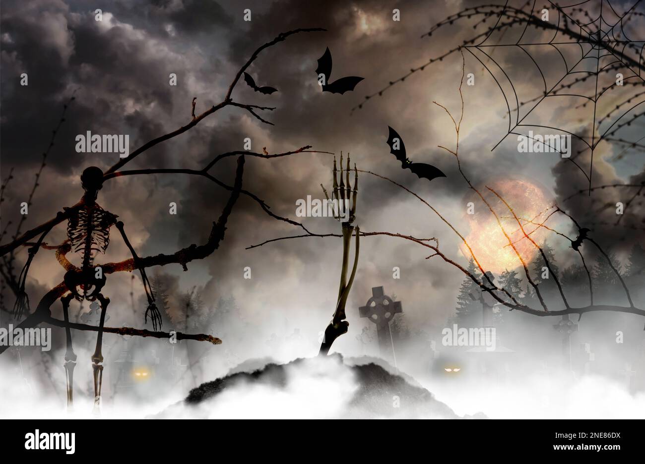 Scary skeleton rising out of grave at misty cemetery Stock Photo - Alamy