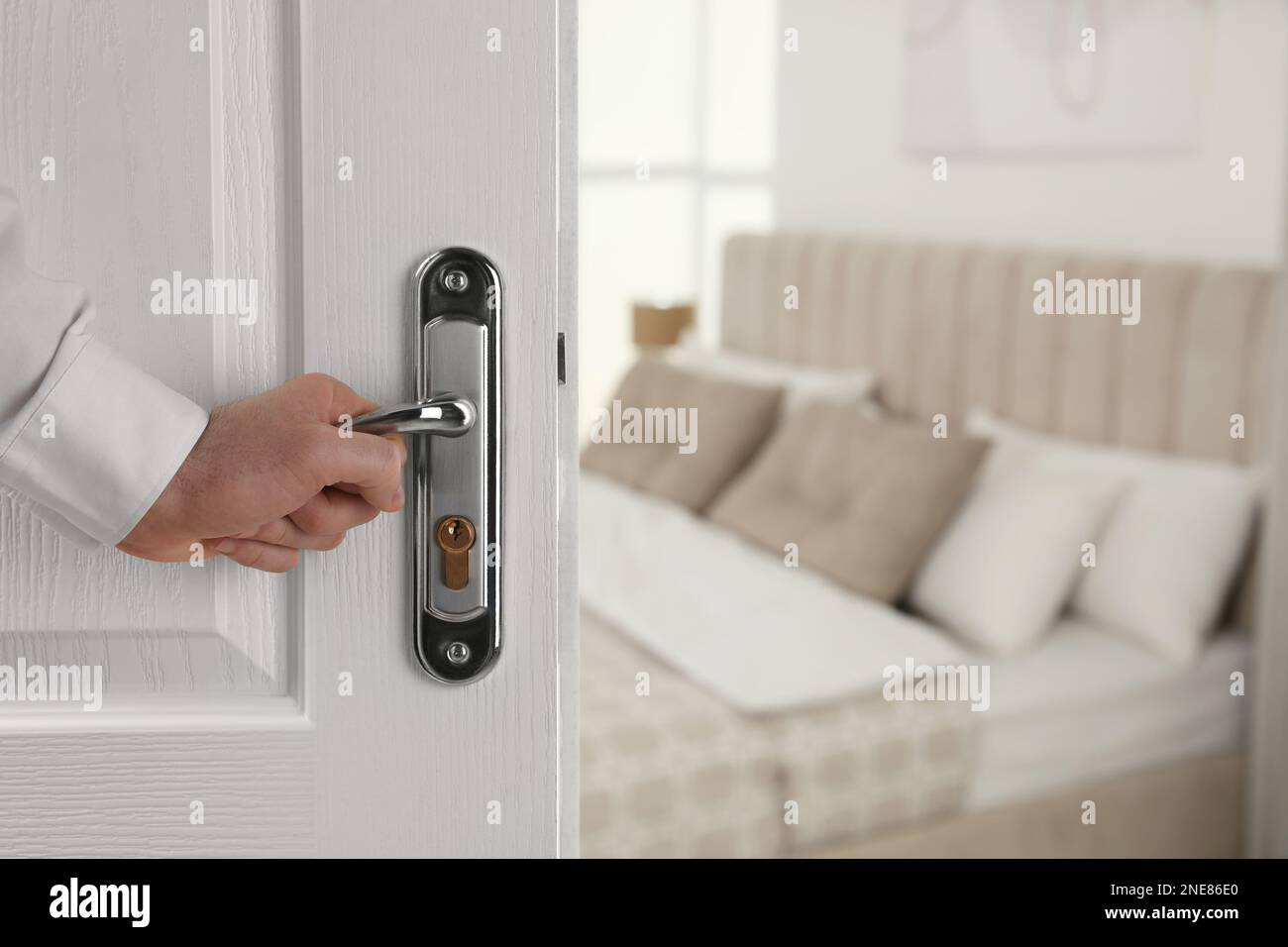 Male door open hotel room hi-res stock photography and images - Alamy