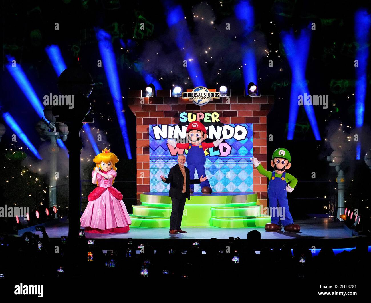 (L-R) Princess Peach, Mark Woodbury, chairman and CEO of Universal ...