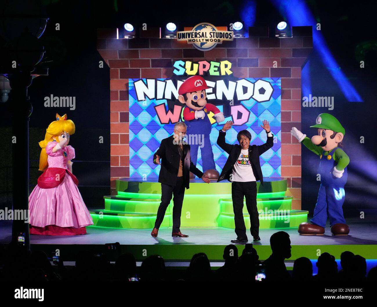 (L-R) Princess Peach, Mark Woodbury, chairman and CEO of Universal ...