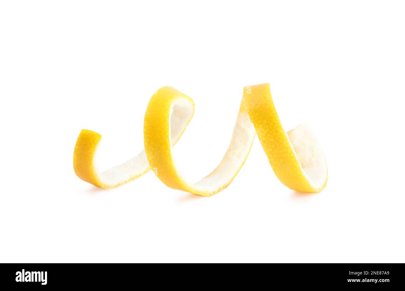 Fresh peel of lemon on white background Stock Photo - Alamy