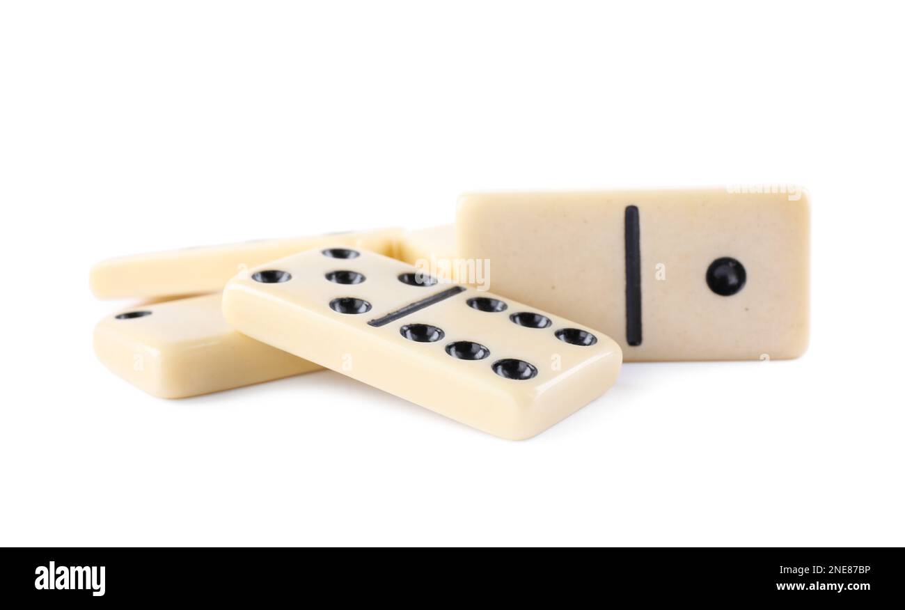 Many classic domino tiles on white background Stock Photo - Alamy
