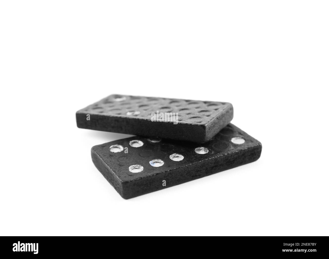 Two black domino tiles on white background Stock Photo - Alamy