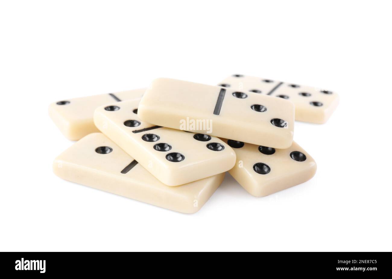 Pile of classic domino tiles on white background Stock Photo - Alamy