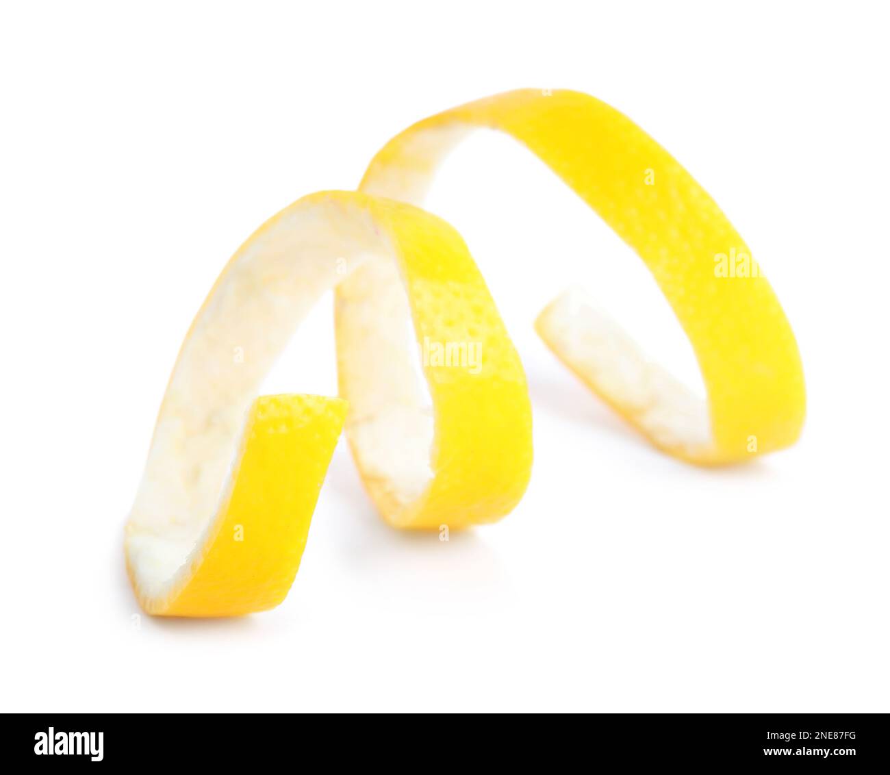 Fresh peel of lemon on white background Stock Photo - Alamy