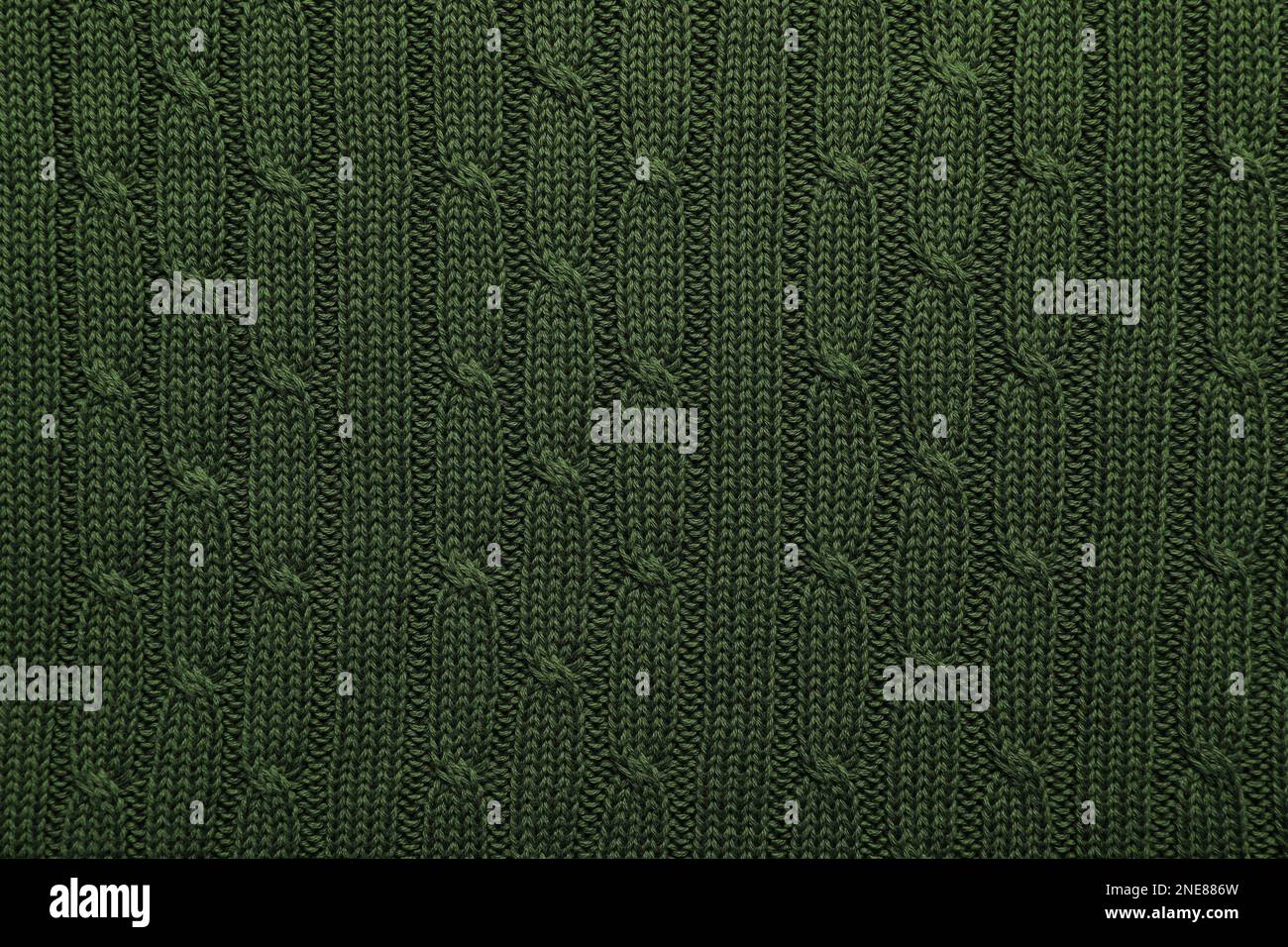 Dark green knitted wool texture as background, top view Stock Photo - Alamy