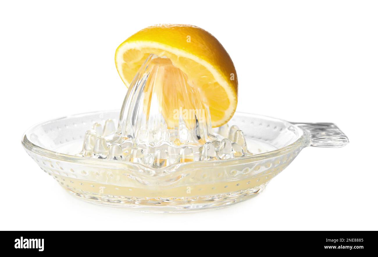 Squeezer with lemon and juice on white background Stock Photo - Alamy