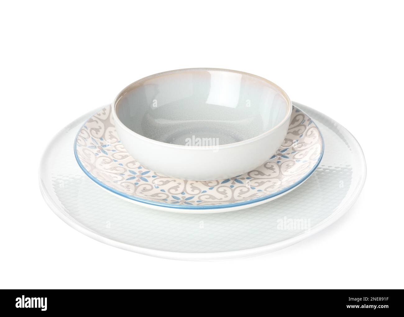 Stack of clean dishes on white background Stock Photo - Alamy