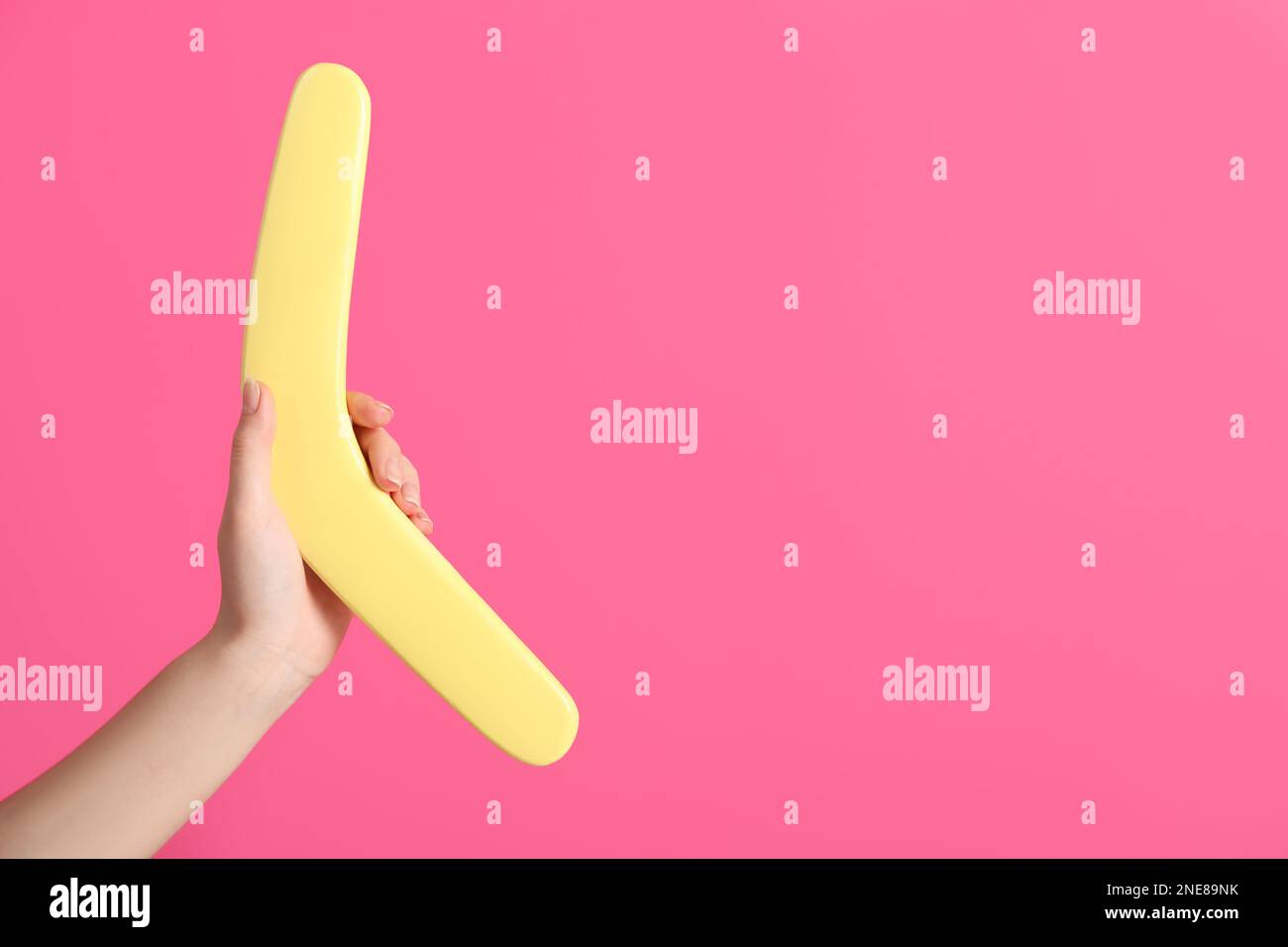 Hand holding boomerang hi-res stock photography and images - Alamy
