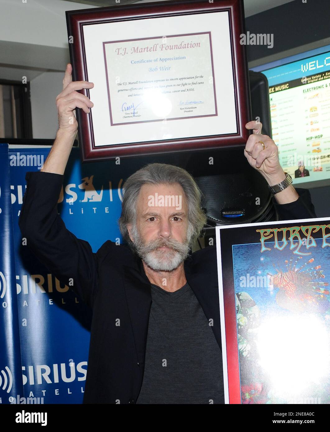 The T.J. Martell Foundation presents musician Bob Weir with a ...