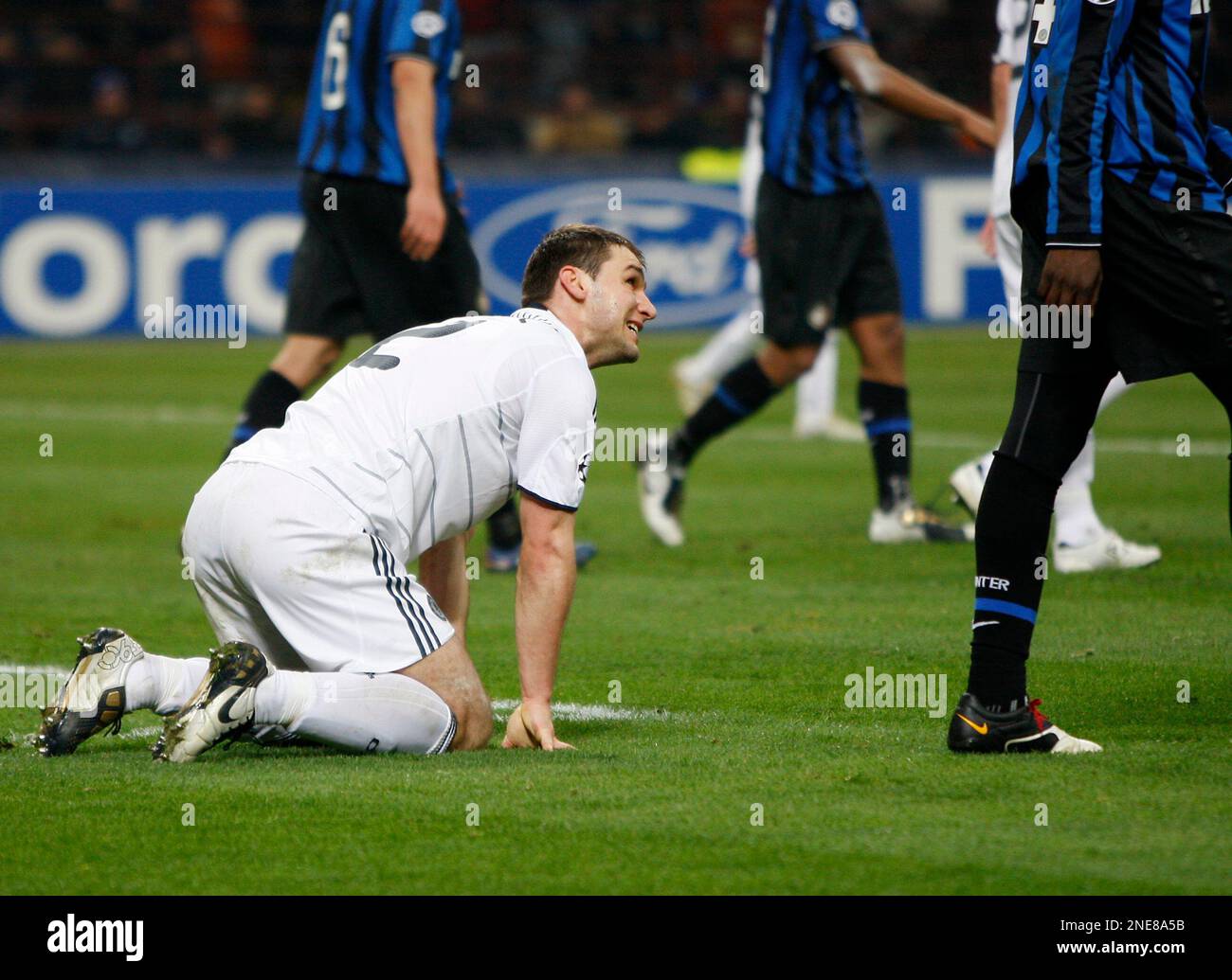 Chelsea defender Branislav Ivanovic, in white, of Serbia, reacts after ...