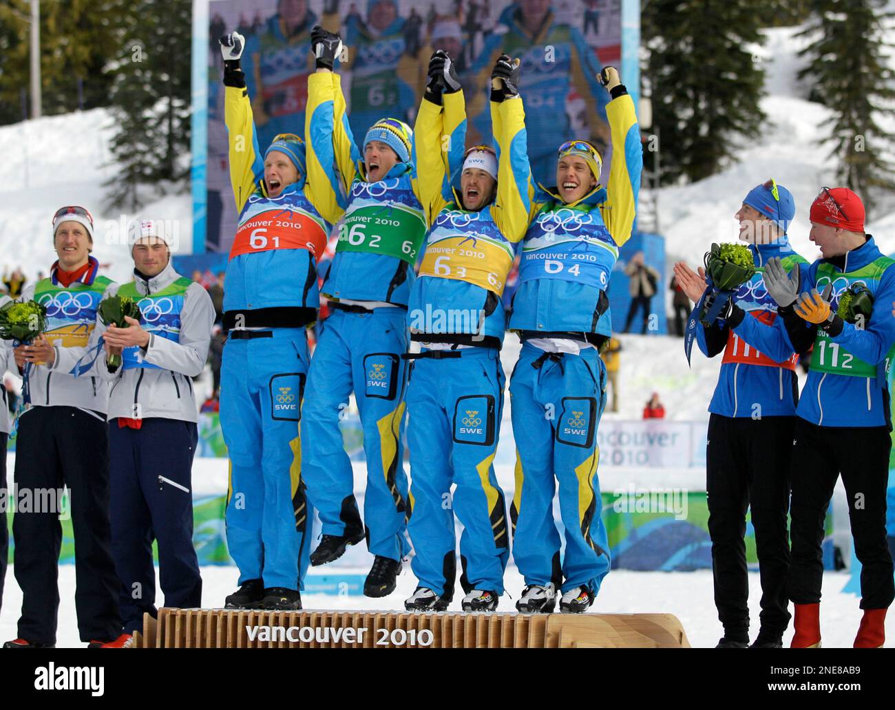 Swedish gold medal winning team, center from left, Sweden's Daniel ...