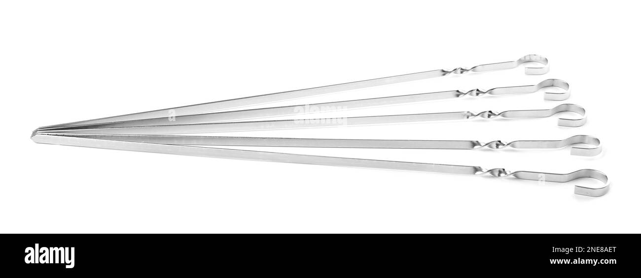 Metal skewers on white background. Barbecue utensil Stock Photo - Alamy