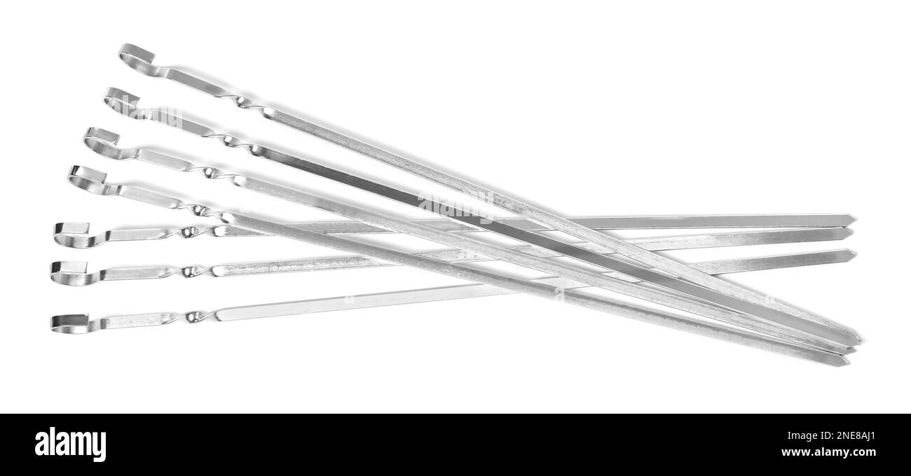 Metal skewers on white background, top view. Barbecue utensil Stock ...