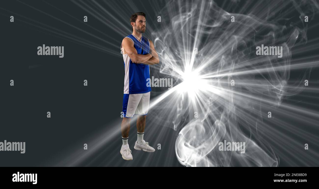 Composition of male basketball player with arms crossed with copy space ...