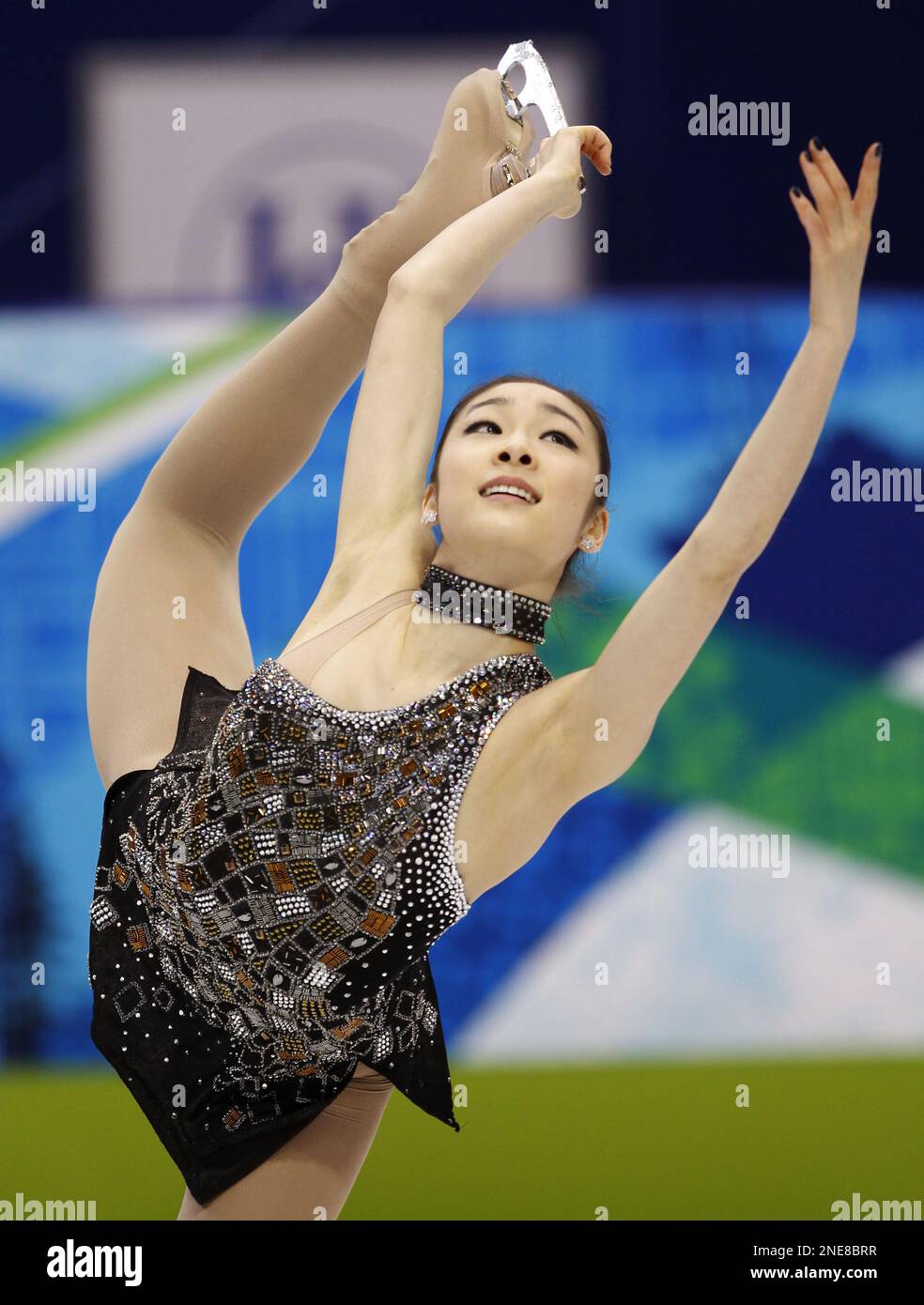Kim Yu-Na, from Korea, performs her short program in the women's ...