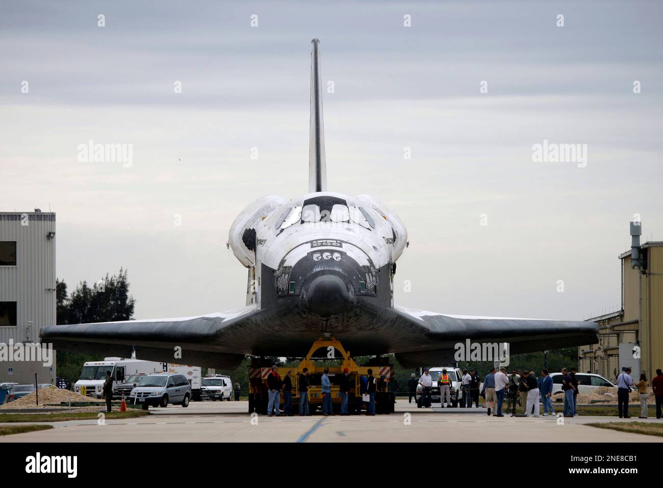 Space shuttle Discovery is transported from the Orbiter Processing ...