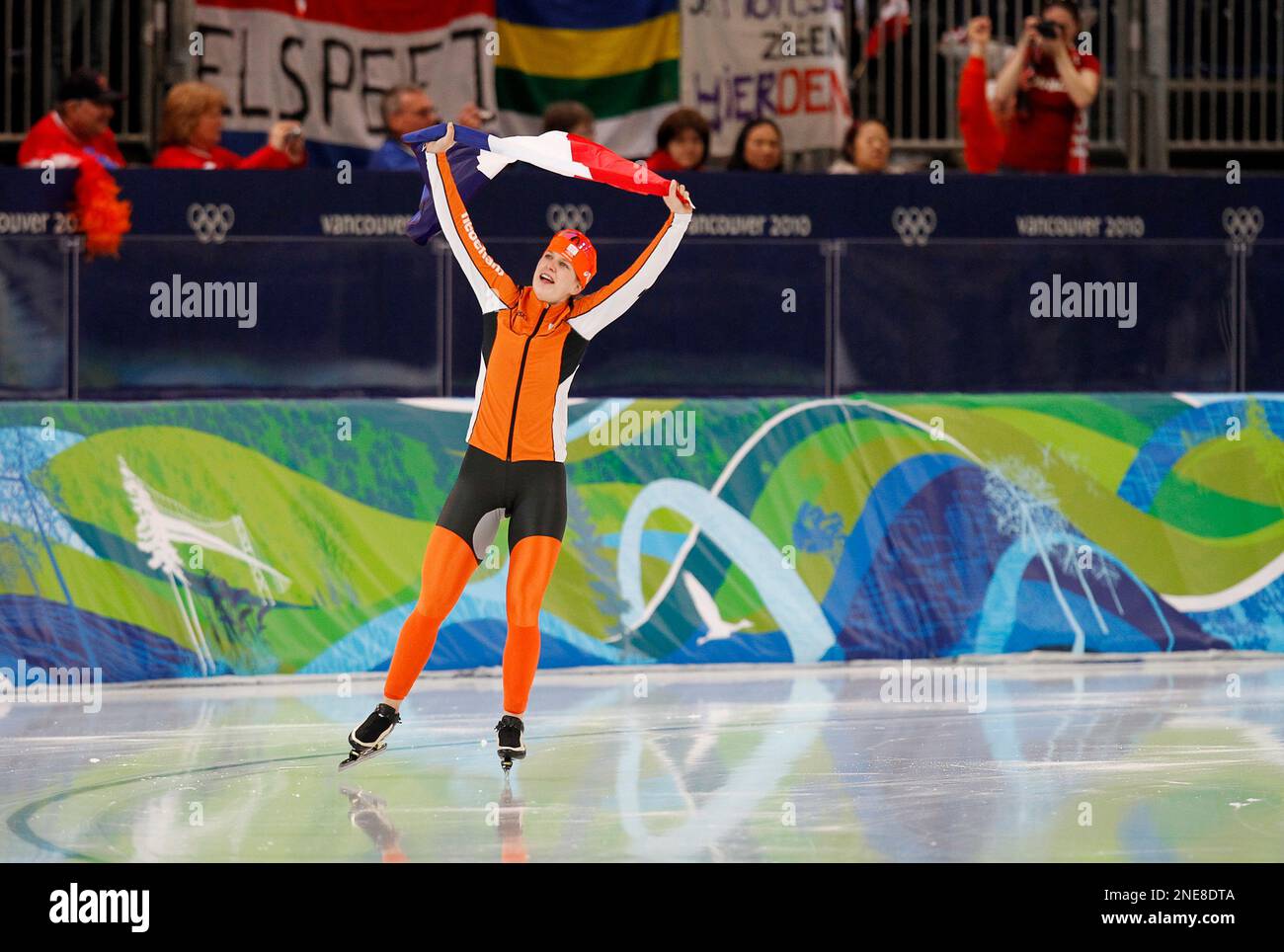 Netherlands's Ireen Wust celebrates her gold medal in the women's 1,500 ...