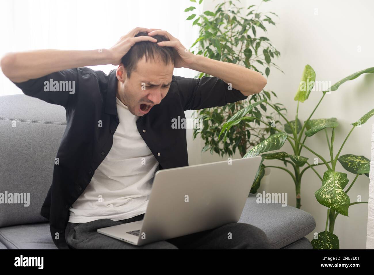 Happy smiling deaf young caucasian man uses sign language while video ...