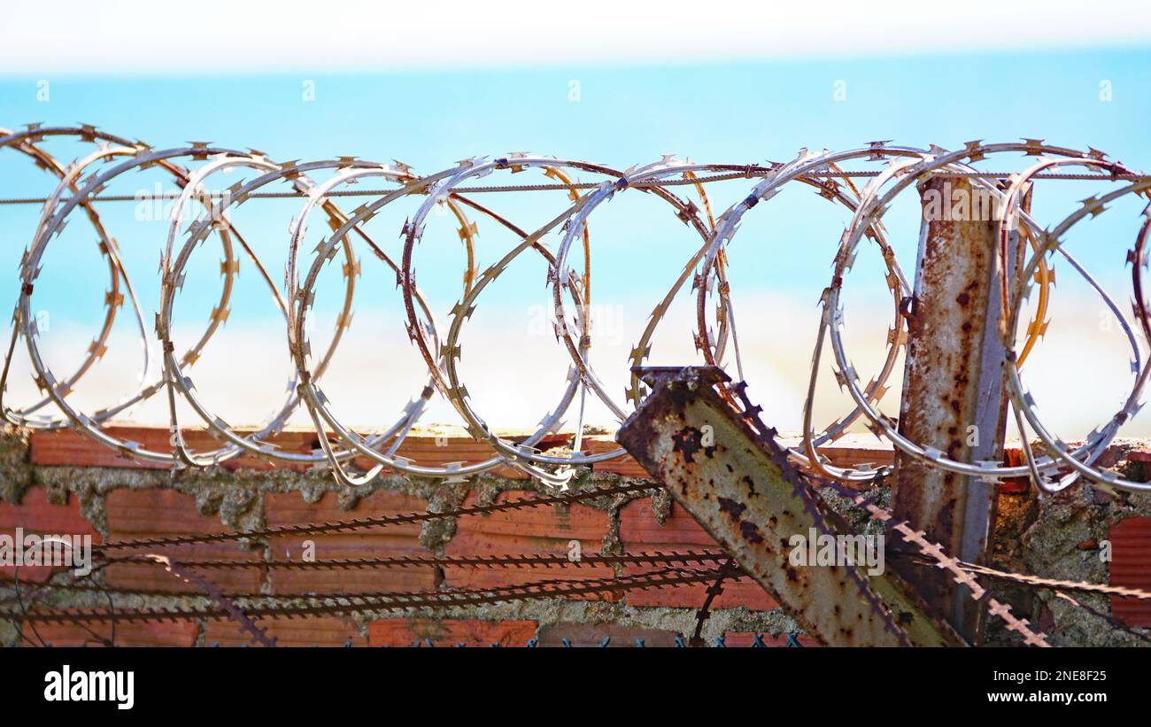 Barbed wire with concertina on a wall in Sant Adria del Besos ...