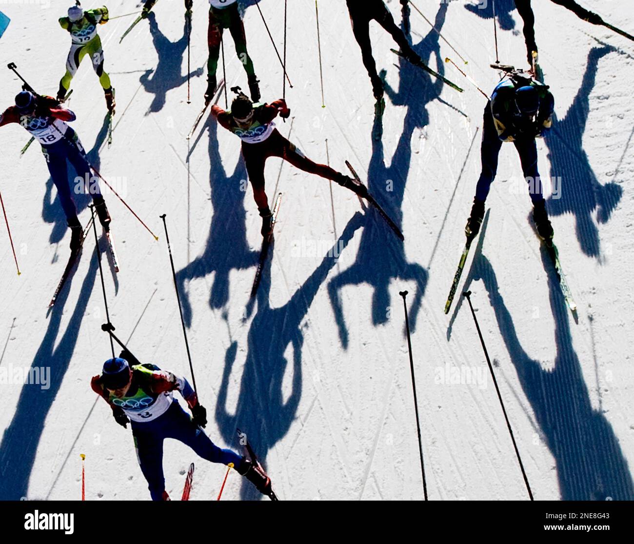 Athletes head from the stadium in the men's 15-kilometre mass start ...