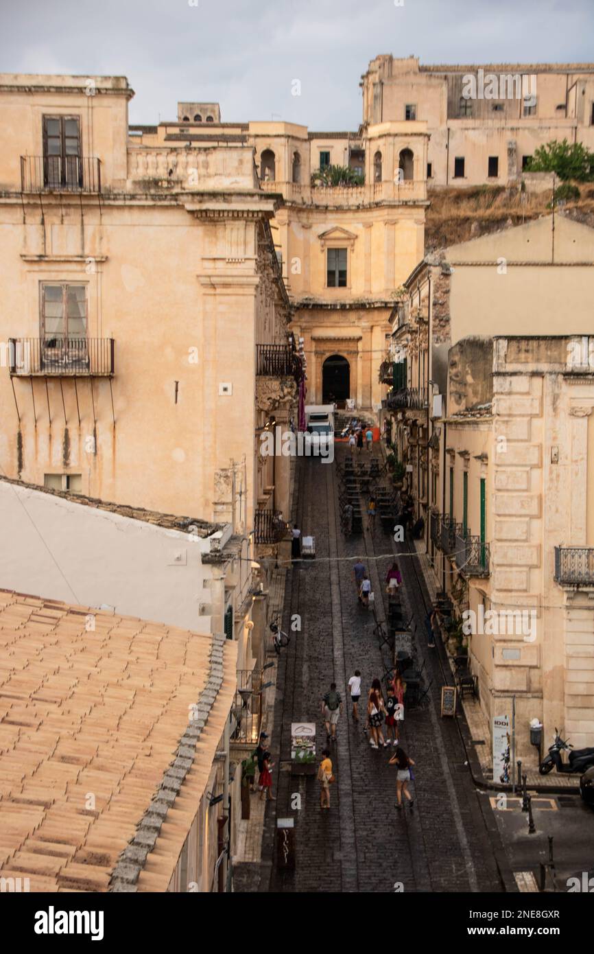 View of the baroque town of Noto from a terrace at sunset Stock Photo ...