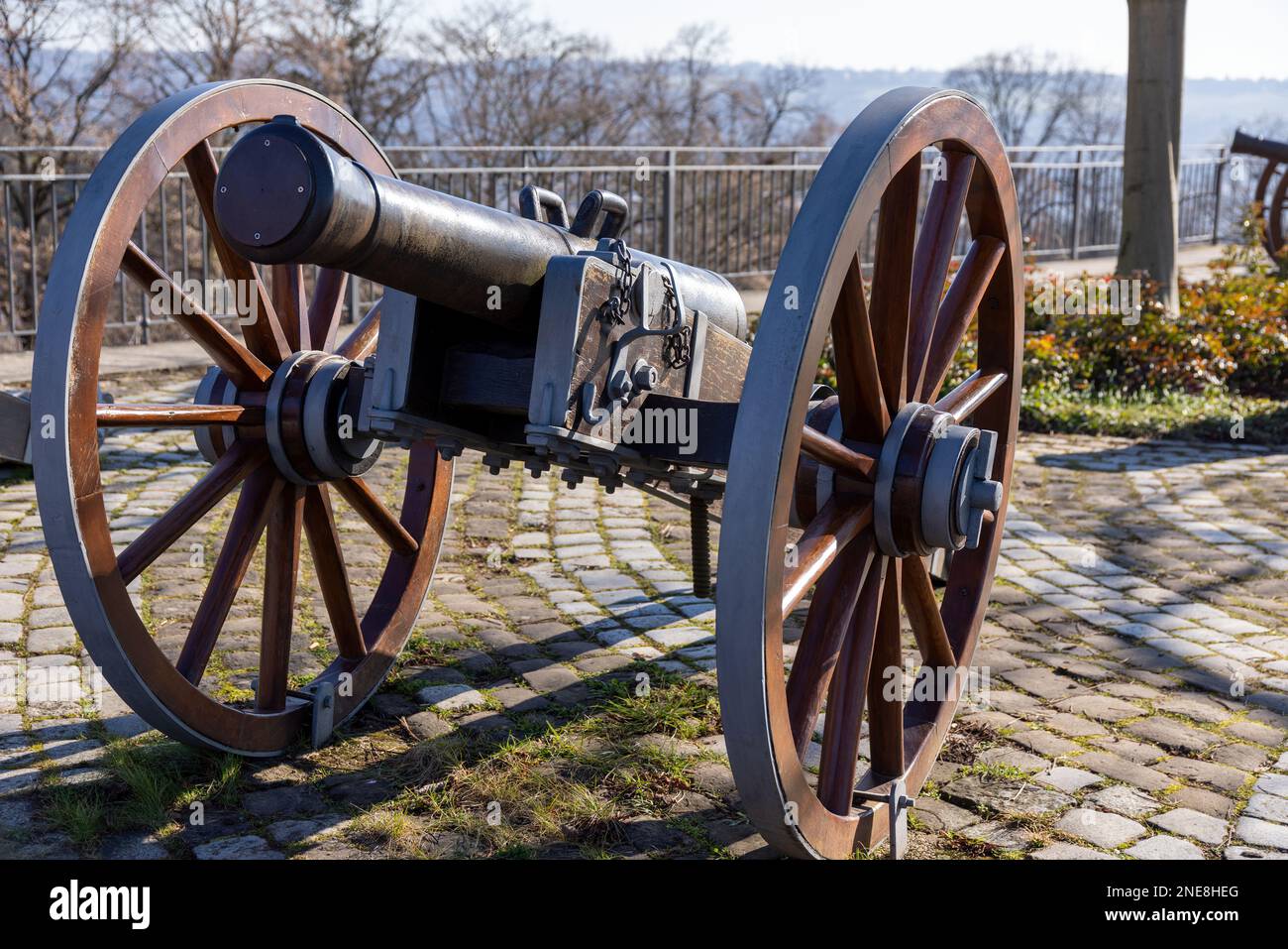 View of a replica of an old historical cannon on a sunny winter day ...