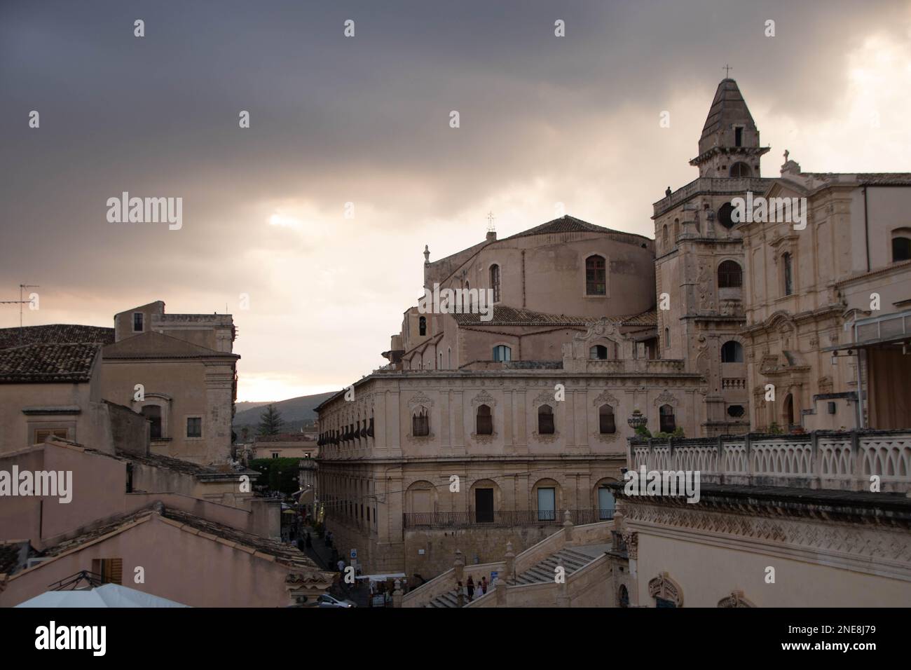 View of the baroque town of Noto from a terrace at sunset Stock Photo ...