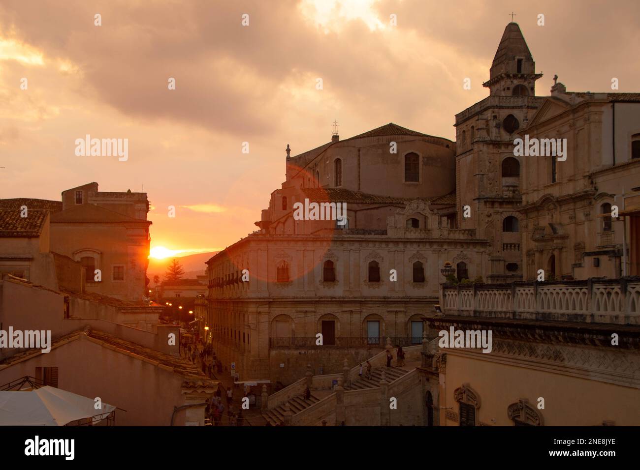 View of the baroque town of Noto from a terrace at sunset Stock Photo ...