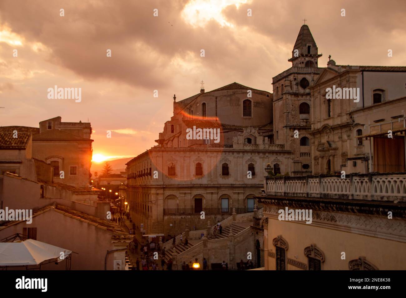 View of the baroque town of Noto from a terrace at sunset Stock Photo ...
