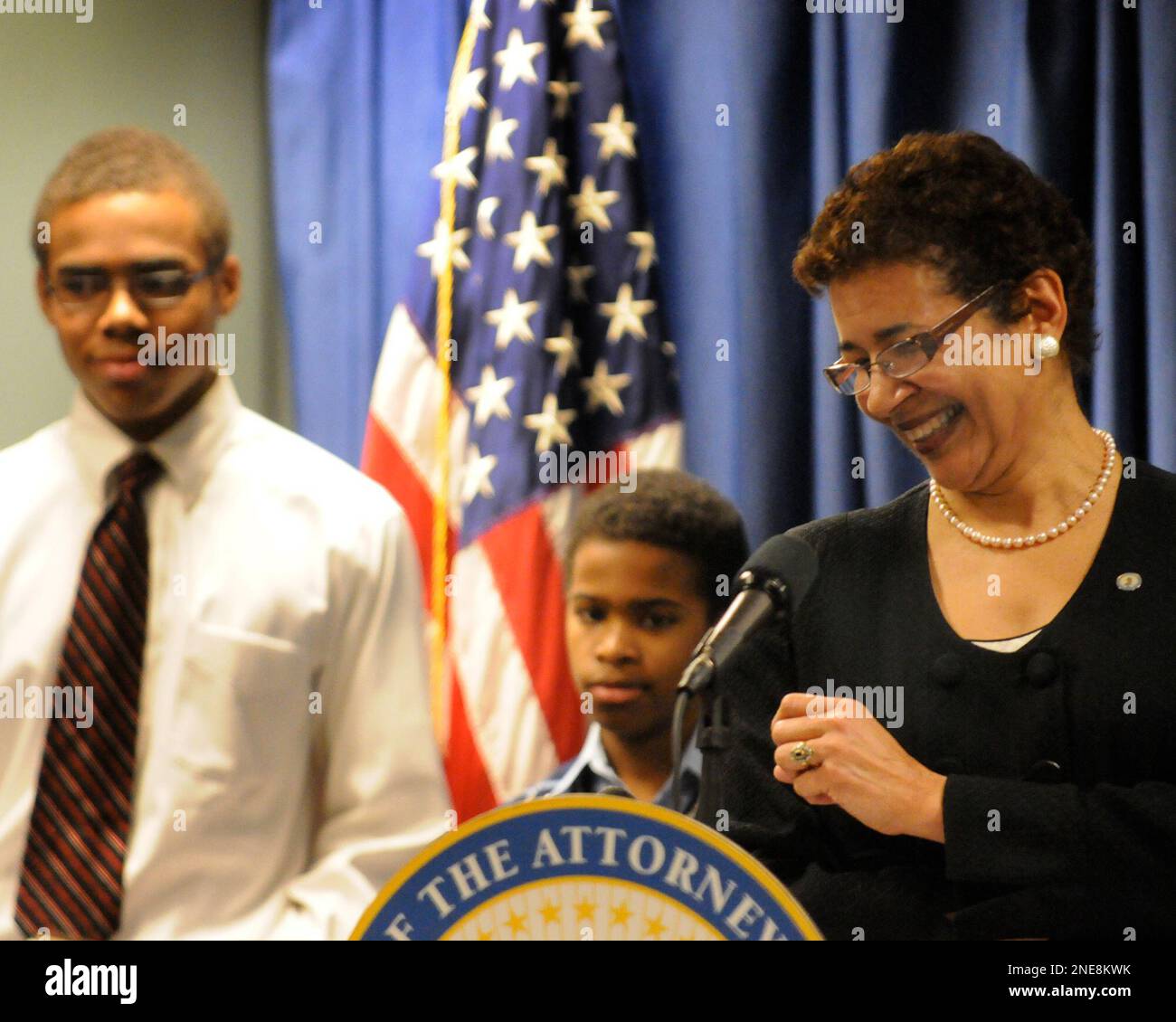 Paula Dow, right, New Jersey's Attorney General, laughs as she speaks ...