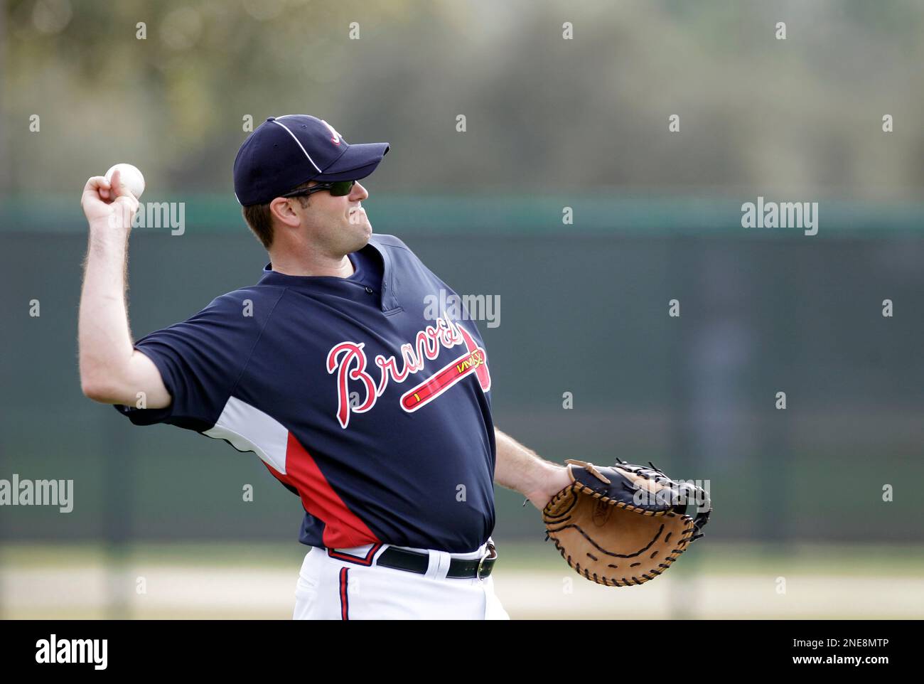 Atlanta Braves first baseman Troy Glaus throws during spring training ...