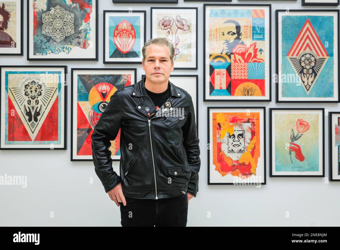London, UK. 16th Feb, 2023. Artist Shepard Fairey with some of his work ...