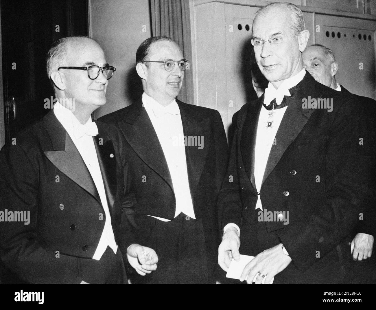 Dr. William Shockley, left, and John Bardeen together with Prof. E ...