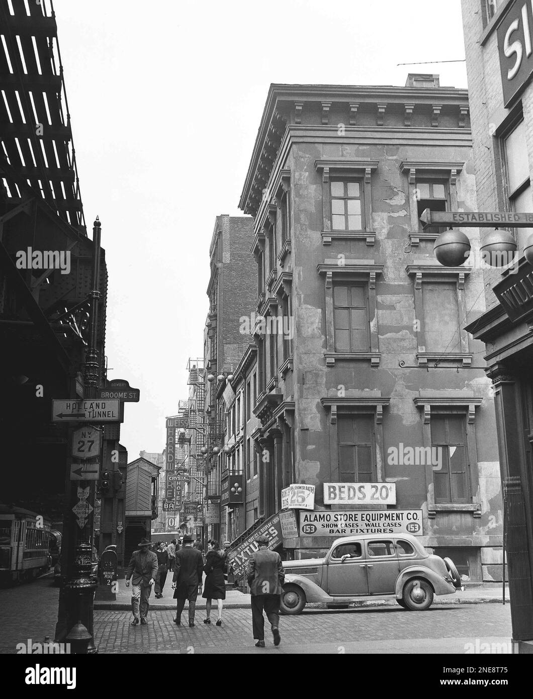 Bowery and Broome Streets in New York City on June 1, 1946. Notice sign ...