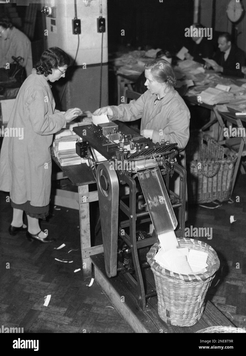 Automatic folding machine at London general post office which folds ...