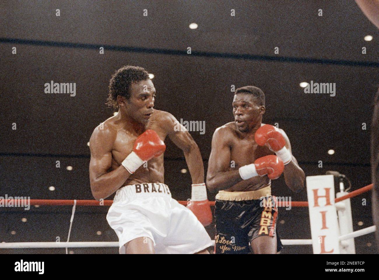 Roger Mayweather, right, connects with a right on his opponent Harold ...
