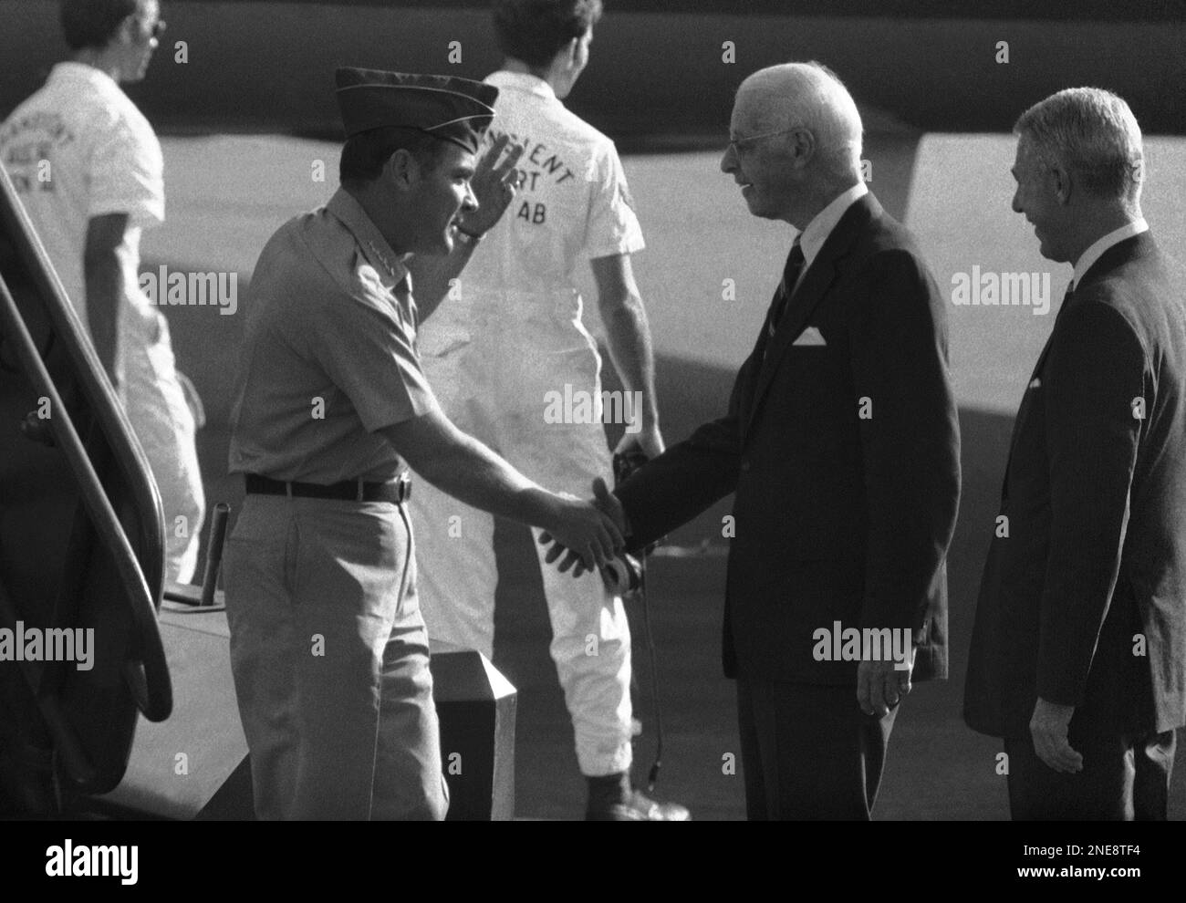 Gen. Alexander N. Haig, Jr., stretches out hand as he is welcomed by ...