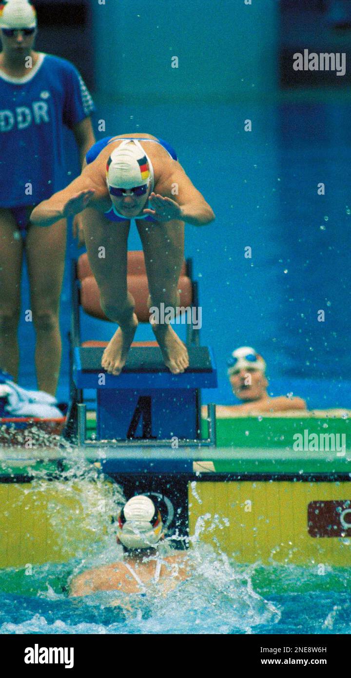 Daniela Hunger of East Germany dives into the third leg of the women?s ...