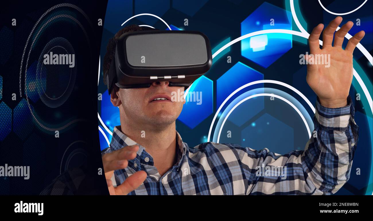 Round scanners against caucasian man wearing vr headset against black ...