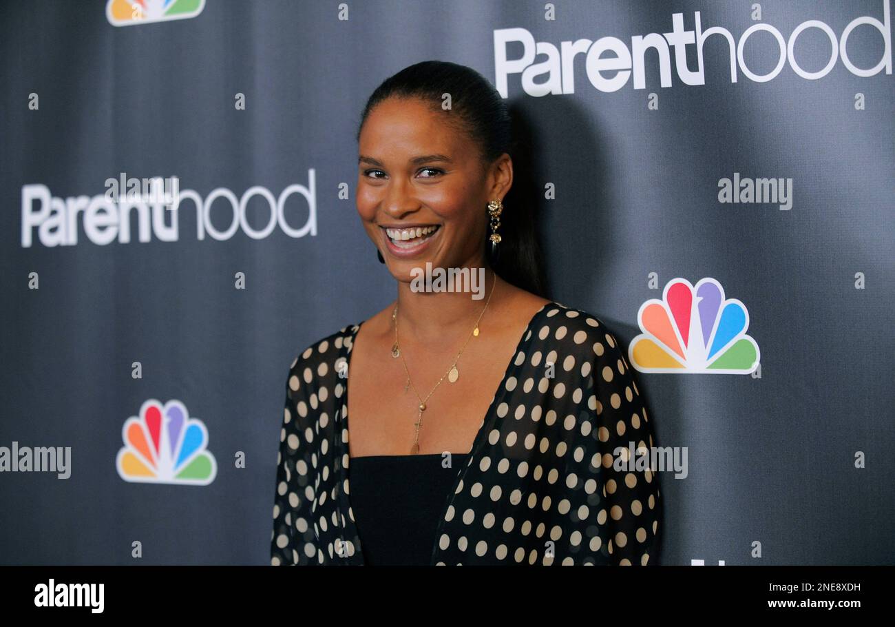 Joy Bryant, a cast member in "Parenthood," poses for photographers at ...